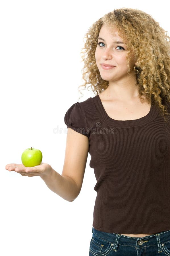 Sostener una manzana foto de archivo. Imagen de sonriente - 5072860