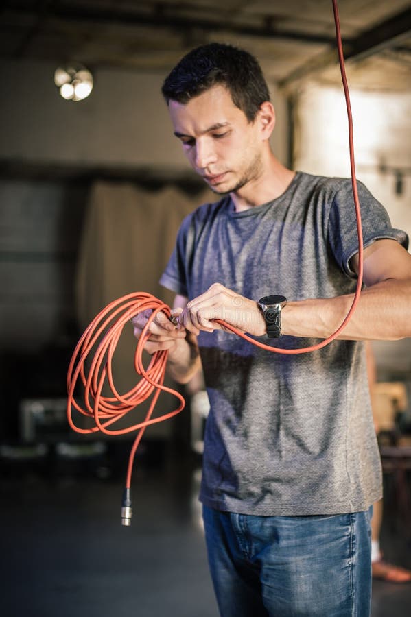Theater Audio Technician Adjusting an Microphones on the Scene Stock ...