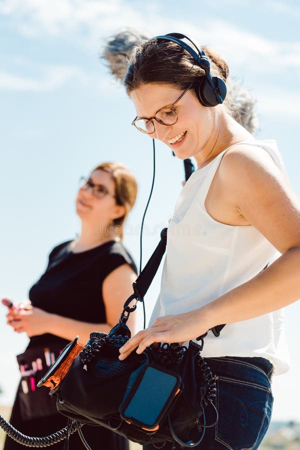 Sound Engineer with Microphone on a Video Production Set Stock Photo ...
