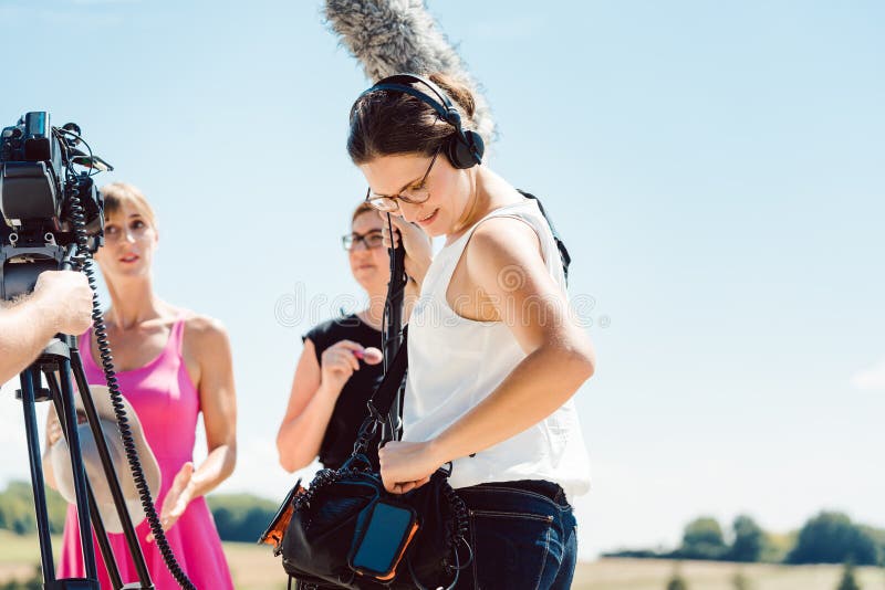 Sound Engineer with Microphone on a Video Production Set Stock Image ...