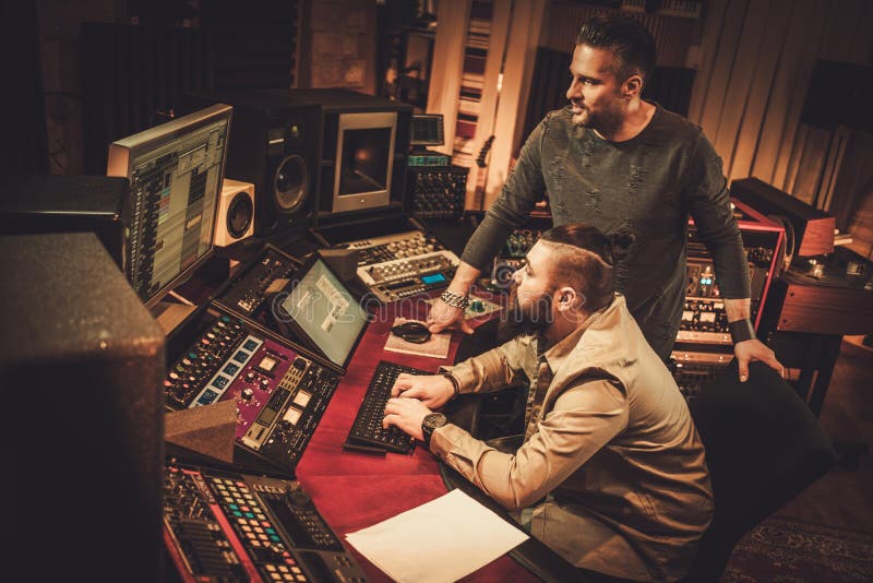 Musicians Recording Vocal and Keyboards in Boutique Recording Studio ...