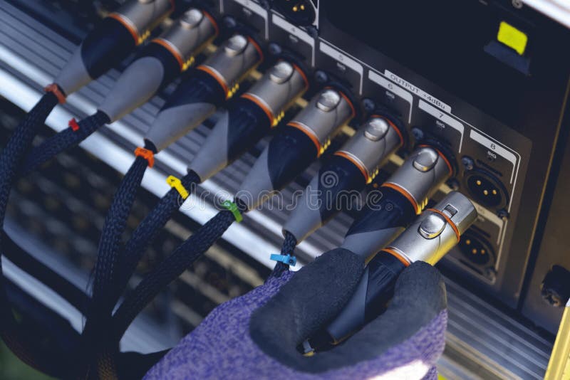 Sound Engineer Plugging Audio Cable on Studio System Boxes Stock Image ...