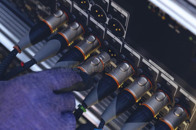 Sound Engineer Plugging Audio Cable on Studio System Boxes Stock Image ...