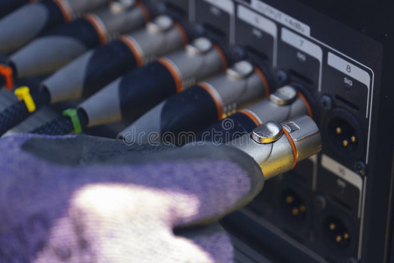 Sound Engineer Plugging Audio Cable on Studio System Boxes Stock Image ...