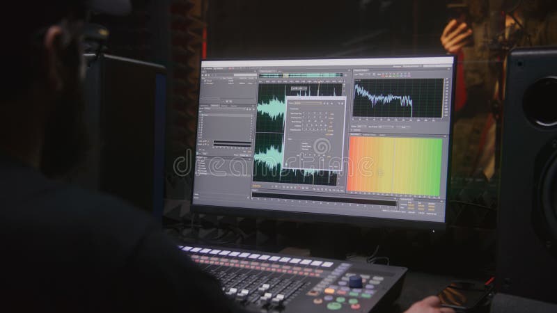 Sound Engineer Uses Control Mixing Surface and Computer Stock Photo ...