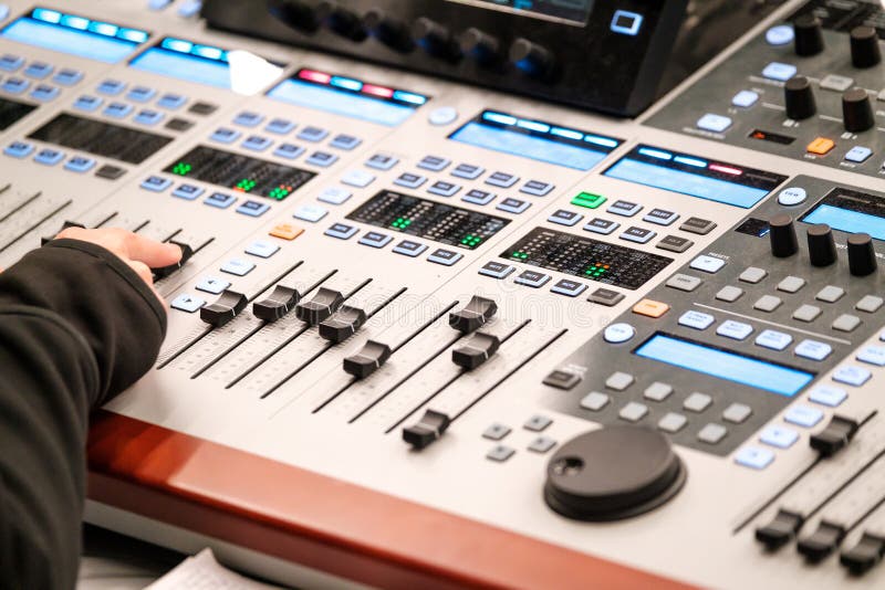 Sound Engineer Using Mixing Console Stock Photo - Image of blur, light ...