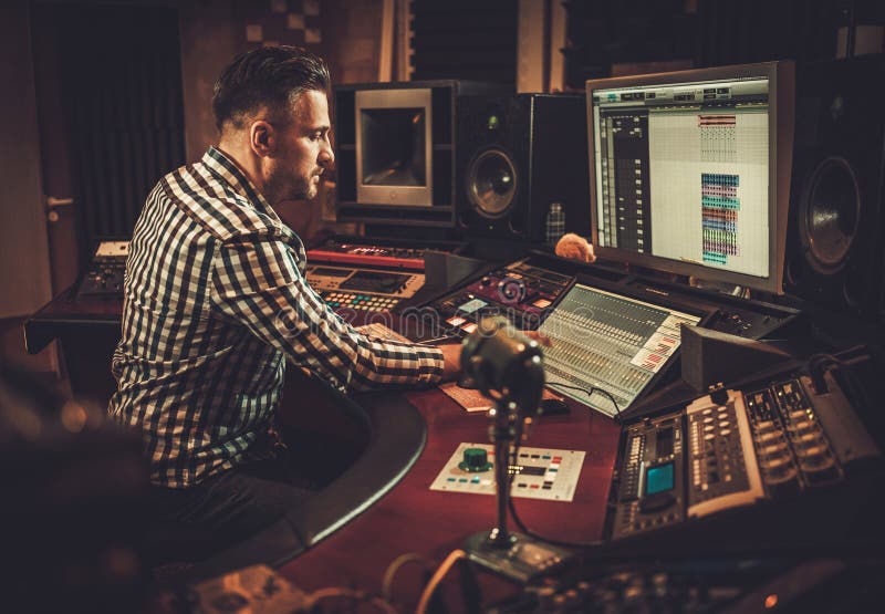 Sound Engineer Working in Boutique Recording Studio. Stock Image ...