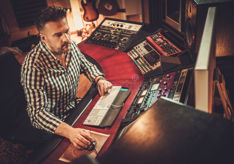 Sound Engineer Working in Boutique Recording Studio. Stock Image ...
