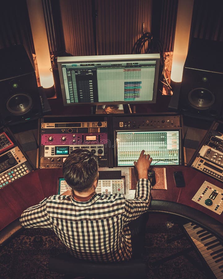 Sound Engineer Working in Boutique Recording Studio. Stock Photo ...