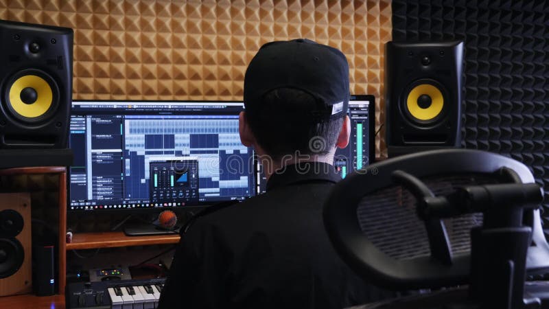 Sound Engineer Working at Home Music Studio with Monitors and Equalizer ...