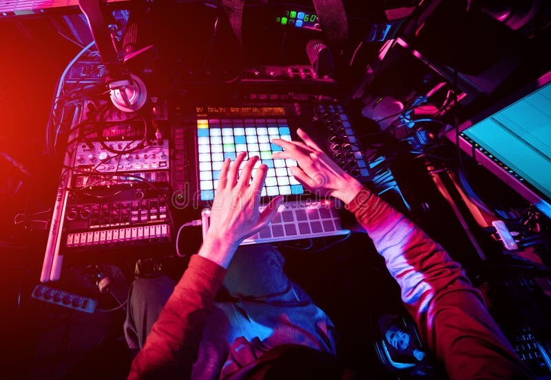 Sound Engineer Working at Mixing Panel in the in Sound Recording Studio ...