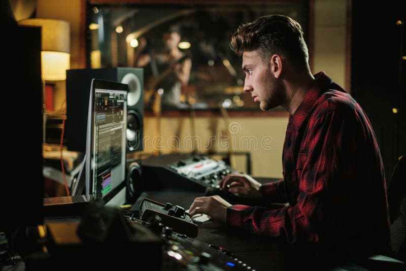 Sound Engineer Working in a Music Studio Stock Image - Image of drums ...