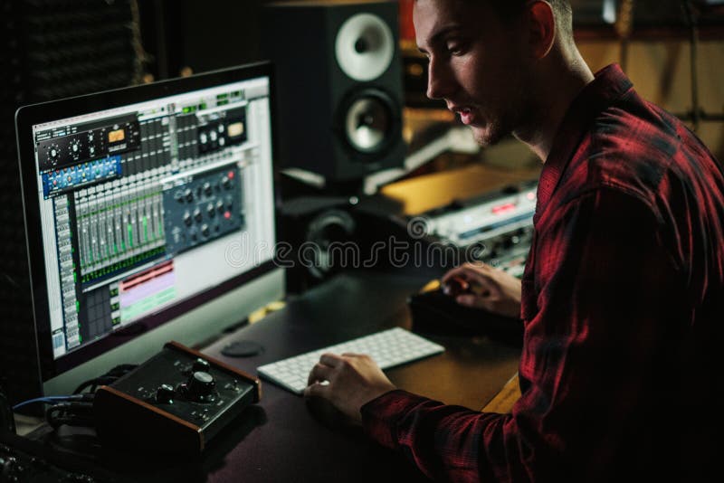 Sound Engineer Working in a Music Studio Stock Photo - Image of audio ...