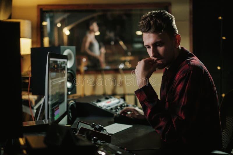 Sound Engineer Working in a Music Studio Stock Image - Image of ...