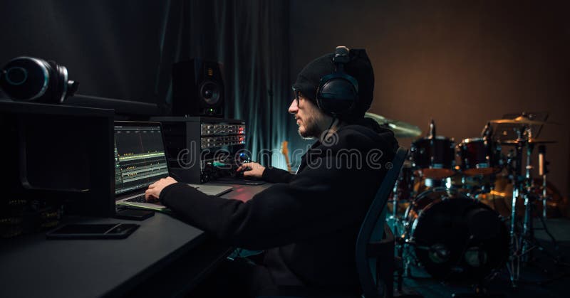 Sound Engineer Working in Recording Studio. Stock Image - Image of ...