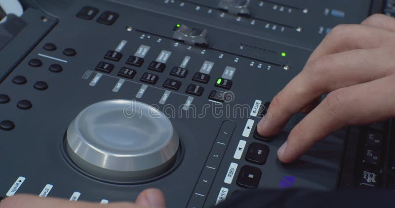 The Sound Engineer Works Behind a Modern Digital Audio Mixer.hands and ...