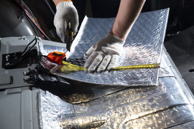 Sound Insulation of the Car. Installation of Sound Insulation Material ...