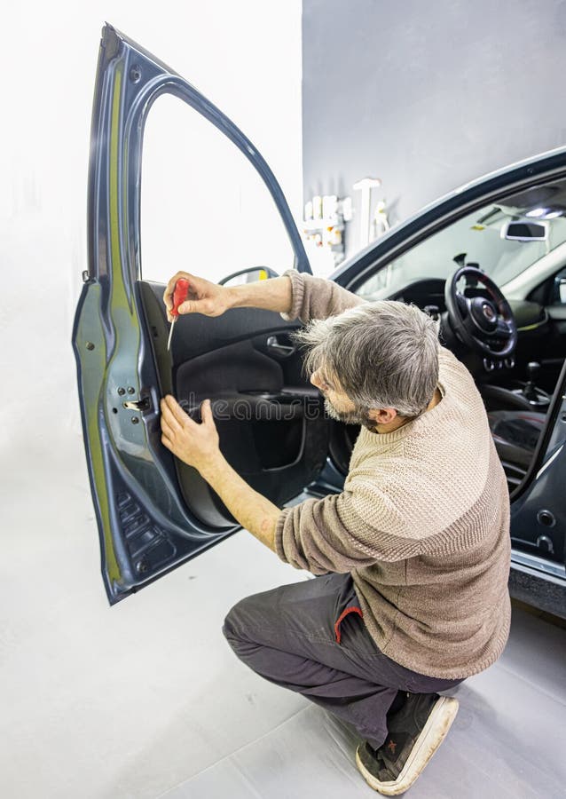 Sound Insulation of the Car. Installation of Sound Insulation Material ...