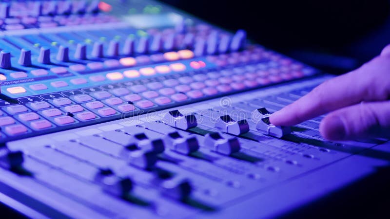Sound Production Concept. Sound Mixing Panel is Being Regulated by a ...