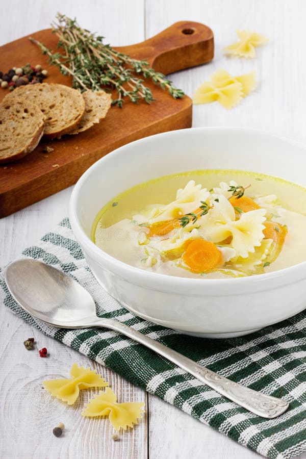 Soup Chicken in a White Bowl with Spoon Stock Image - Image of bread ...