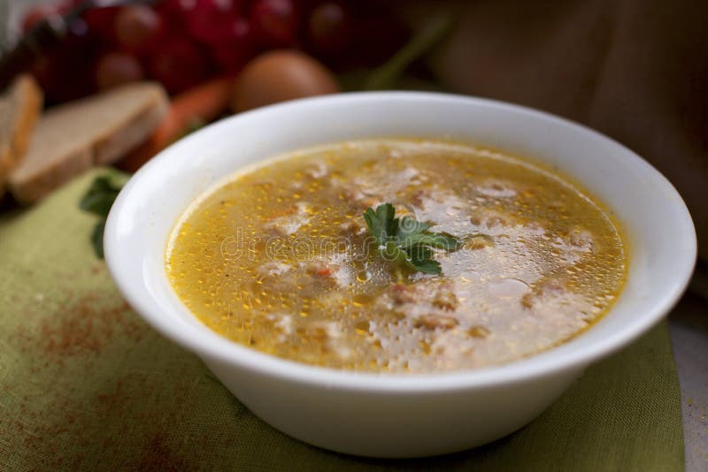 Shorpo in a White Plate with a Piece of Beef Meat in a Broth with ...