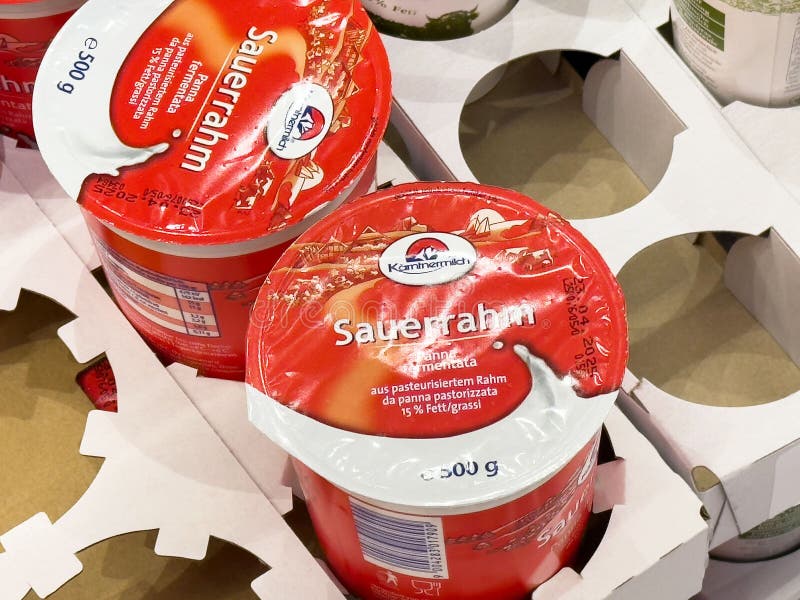 Sour Cream Containers in Packaging Display with German Labeling ...