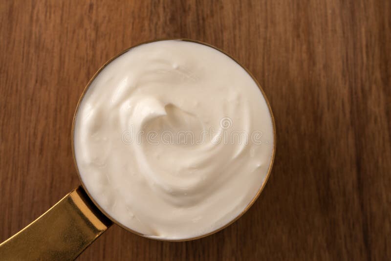 Sour Cream in a Measuring Cup Stock Photo - Image of wood, sour: 269130674