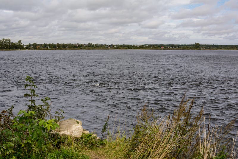 The Source of the Neva River. Gray Heavy Clouds. Severe Lake Ladoga ...
