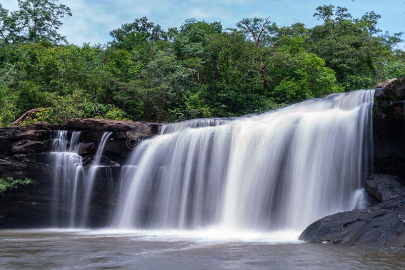 The Source of the River in the Forest. Waterfall with Forest in the ...