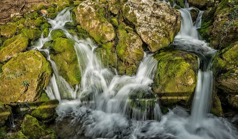 Source of the River that Makes Waterfalls Over Rocks Covered Wit Stock ...