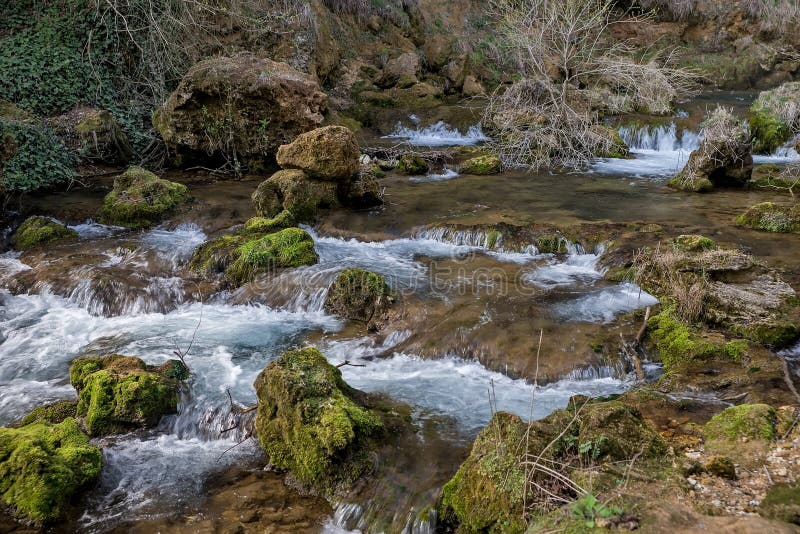 Source of the River that Makes Waterfalls Over Rocks Covered Wit Stock ...