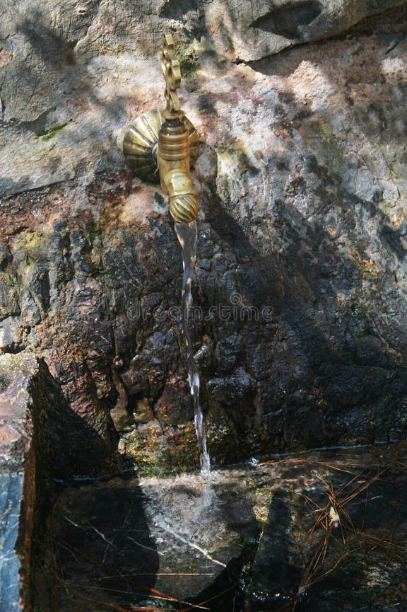 A Source of Spring Water in a Rock. Stock Image - Image of empty, rock ...