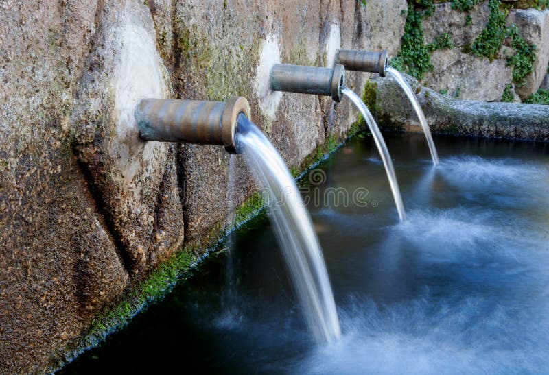 Source of Three Pipes with Crystal Clear Water Stock Photo - Image of ...