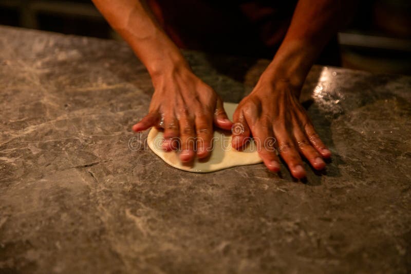 Making Roti Canai or Paratha Stock Photo - Image of curry, cook: 375469892