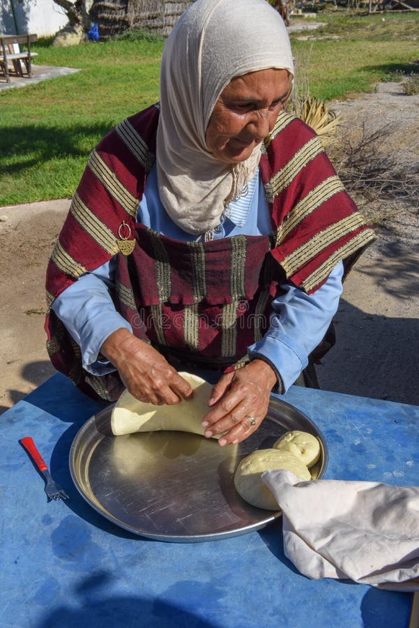 Old Lady Baking a Traditional Arab Bread at Sousse in Tunisia Editorial ...