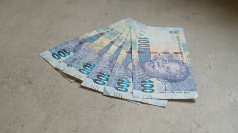 South African 100 Rand Banknotes Featuring Mandela are Spread Out on a ...