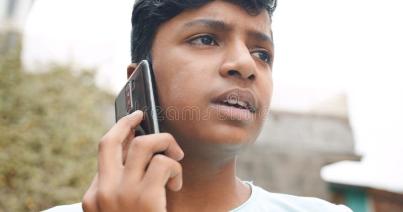South Asian Boy from India Talking on Phone Stock Photo - Image of ...