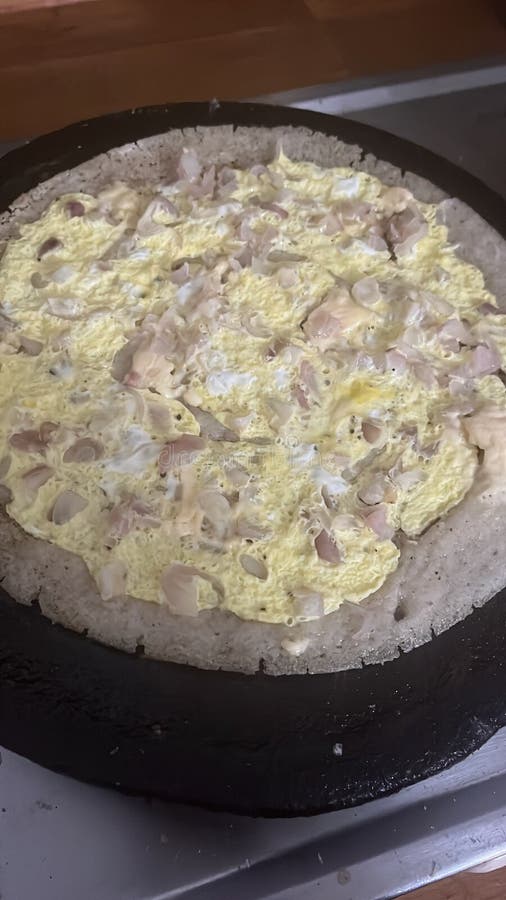 South Indian Breakfast Dosa with Egg, Onion and Cheese Stock Image ...