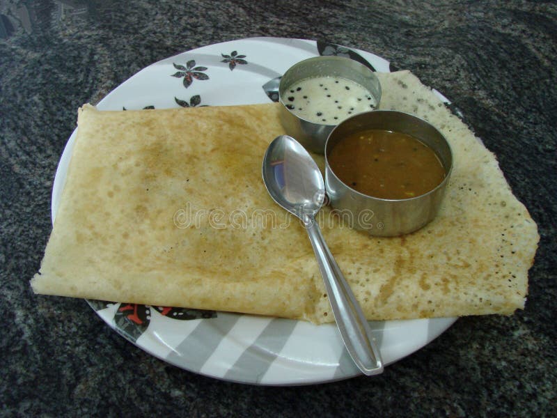 South Indian Breakfast, Dosa, Masala, with a Spoon Stock Photo - Image ...