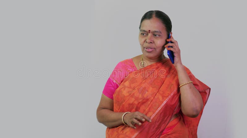 A South Indian Women Speaking in Mobile Phone in Front of Camera on ...