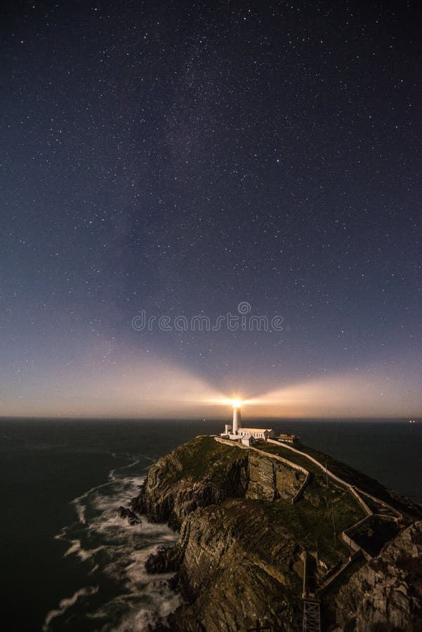 South stack lighthouse stock photo. Image of night, beam - 136826832