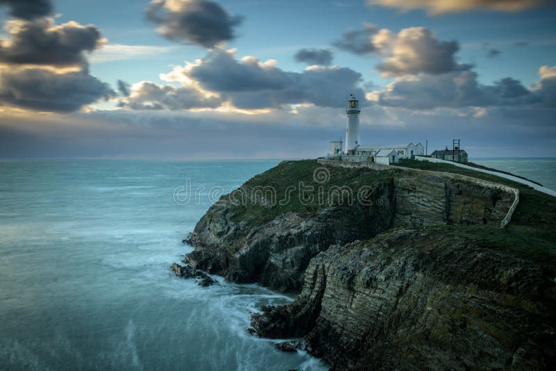 South Stack Lighthouse during the Golden Hour Stock Photo - Image of ...