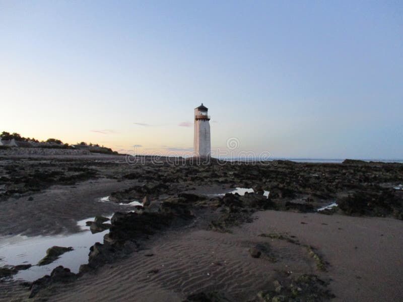 Southerness lighthouse stock photo. Image of beach, rocks - 151190656