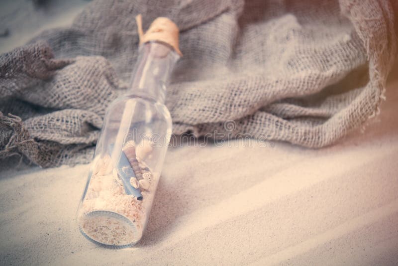 Souvenir Bottle and Fishnet on the Sand Stock Image - Image of season ...
