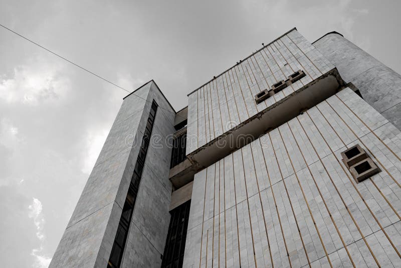 Soviet Brutalist Architecture. High Gray Walls with Small Windows Stock ...