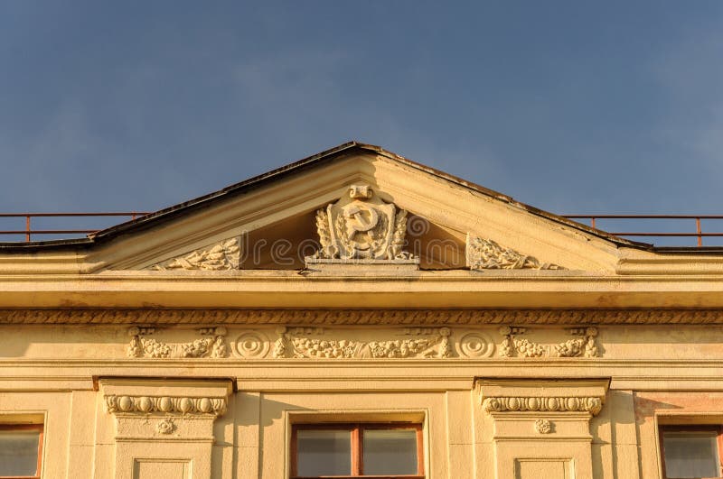 Soviet Symbols on the Gable of Old Building Stock Photo - Image of ...