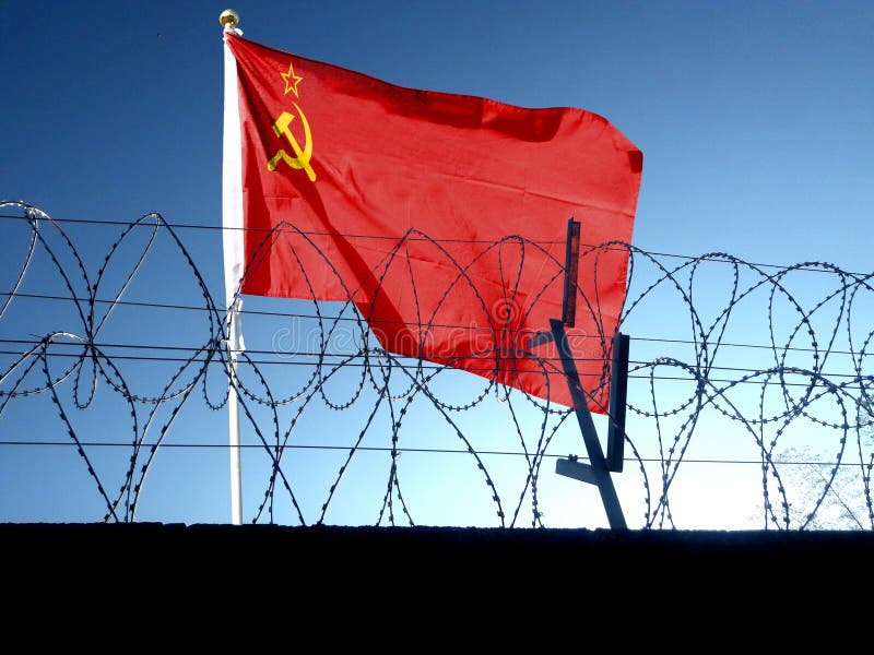 The Soviet Union Flag Hangs in the Cloudy Sky Outside the Prison S ...