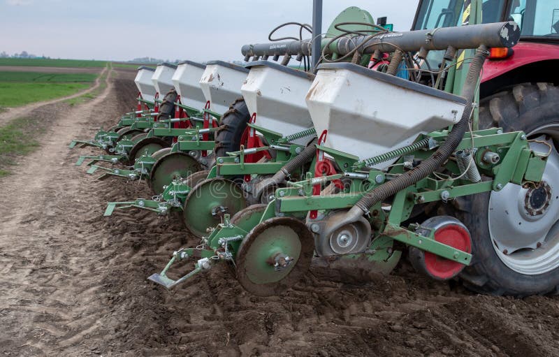 Sowing Equipment Attached To Tractor in Field Stock Photo - Image of ...