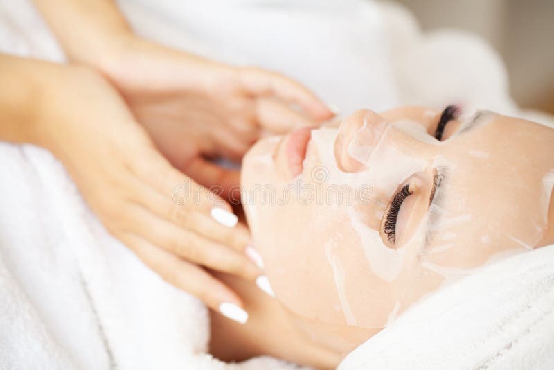 Spa, Attractive Funny Women with Fabric Mask on Face. Stock Photo ...