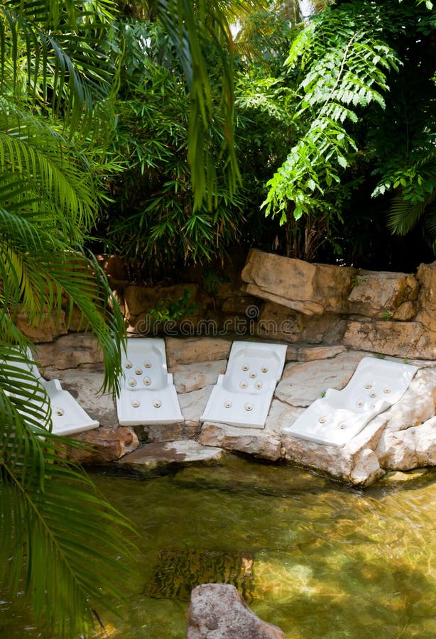 Spa bed at the poolside stock photo. Image of climate - 20560606